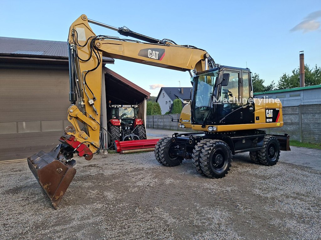 Caterpillar M 316 D bager točkaš