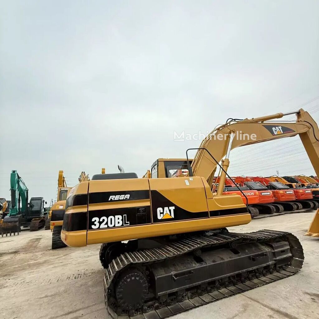 Caterpillar 320BL bager guseničar