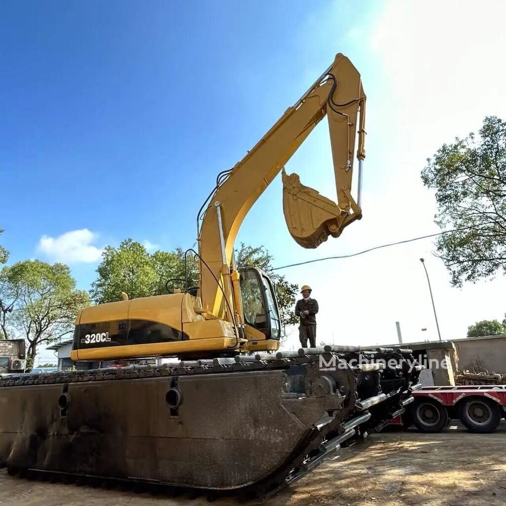 Caterpillar 320CL bager amfibija
