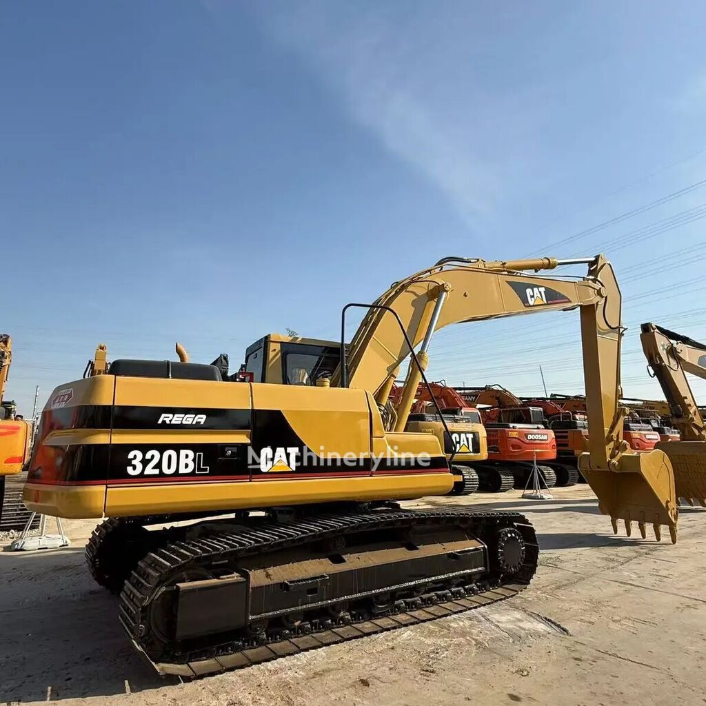 Caterpillar 320bl bager guseničar