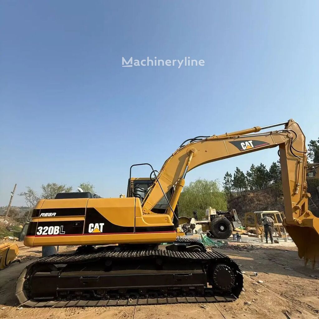 Caterpillar 320BL bager guseničar