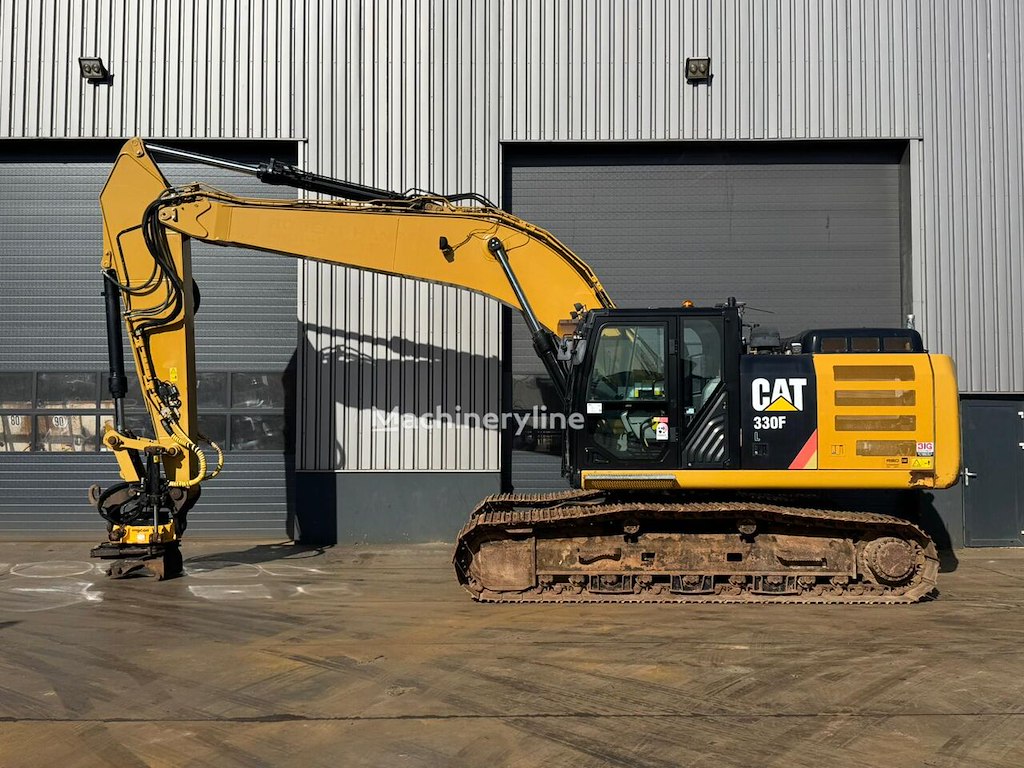 Caterpillar 330FL bager guseničar
