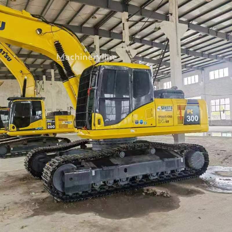 Komatsu PC 300-7 bager guseničar