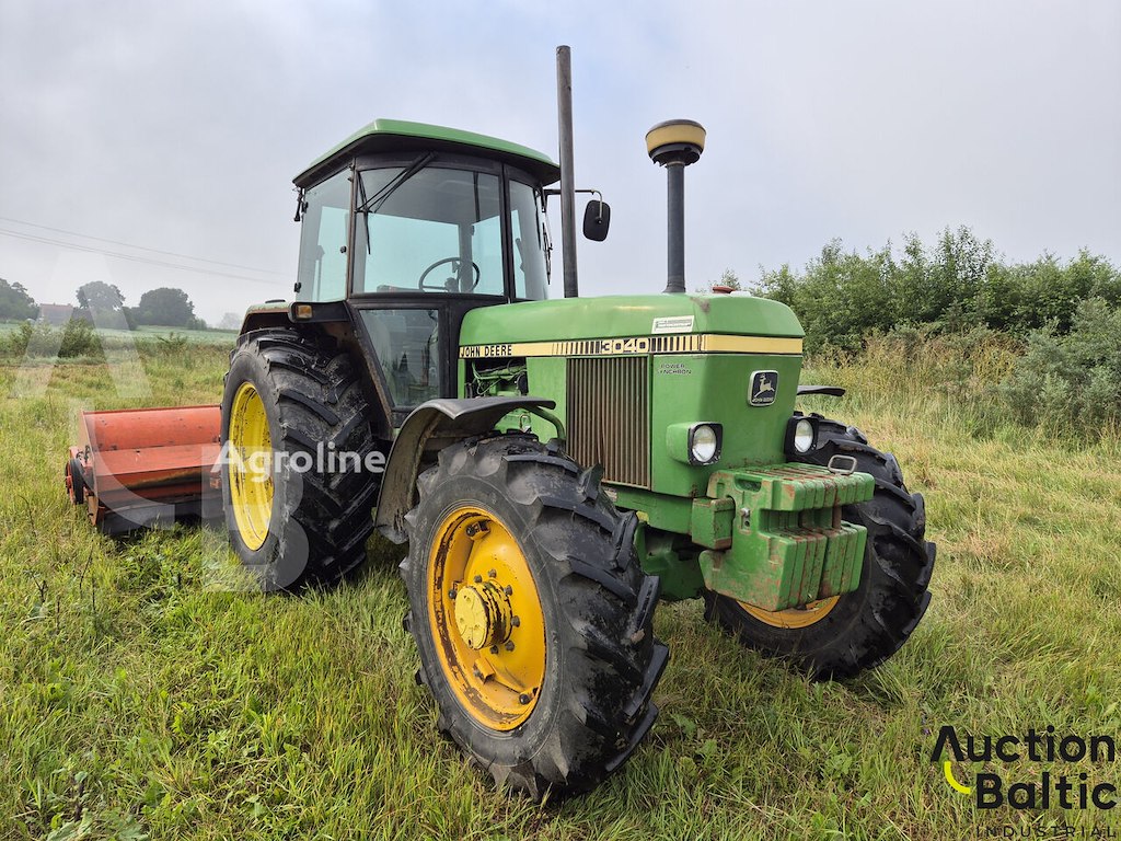 Prodaje se John Deere MFWD traktor točkaš na aukciji