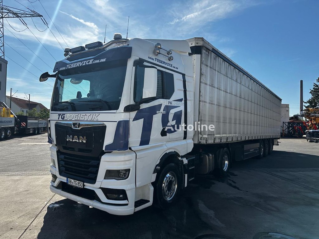 Prodaje se MAN TGX L.2018.858.001 kamion sa kliznom ceradom na aukciji