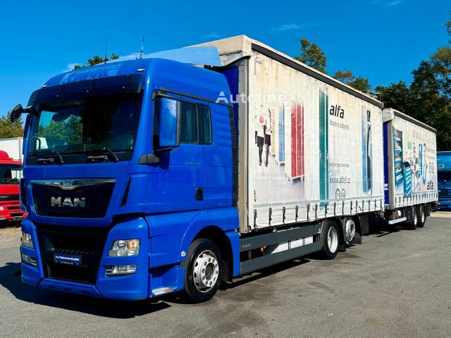 MAN TGX 26.440 EURO 6 kamion s ceradom + prikolica sa ceradom