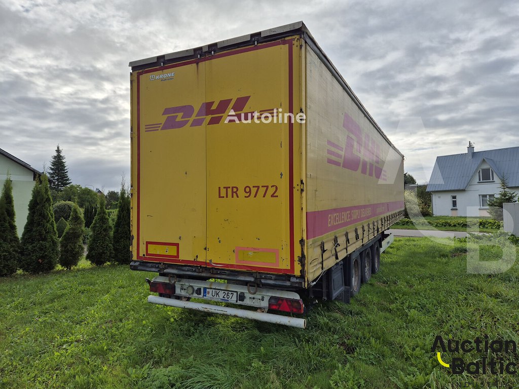 Prodaje se Krone SD poluprikolicu sa kliznom ceradom na aukciji