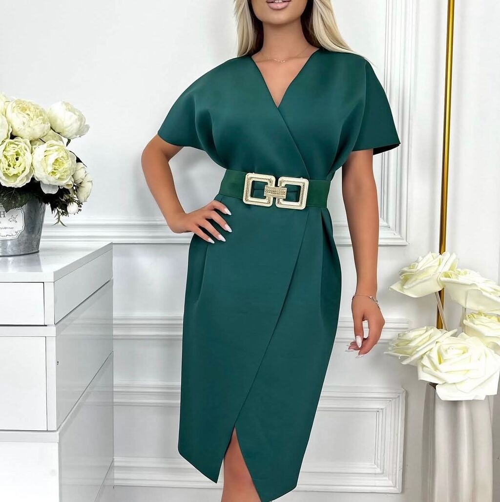 Elegantna midi haljina u smaragdno zelenoj boji, idealna za svečane
