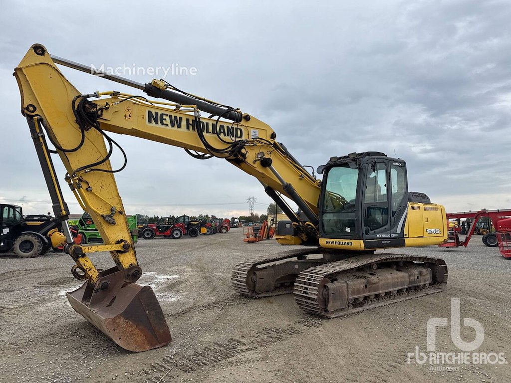 Prodaje se New Holland E245C bager guseničar na aukciji