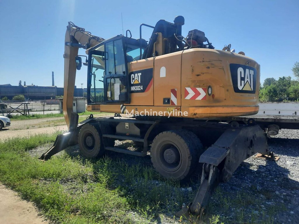 Caterpillar MH3024-06 bager točkaš