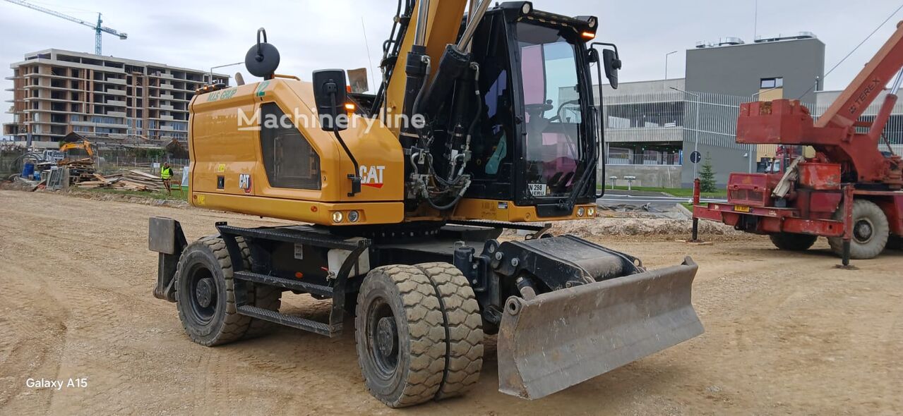 Caterpillar M318 bager točkaš