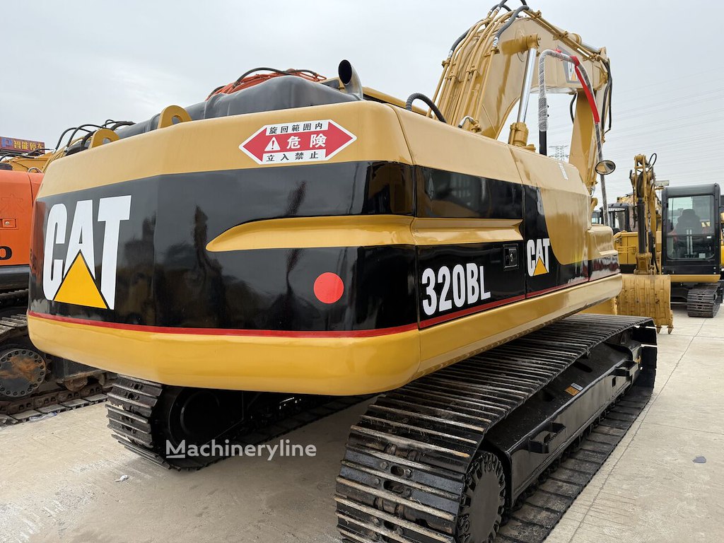 Caterpillar 320BL bager guseničar
