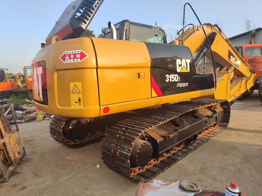 Novi Caterpillar 315D bager guseničar