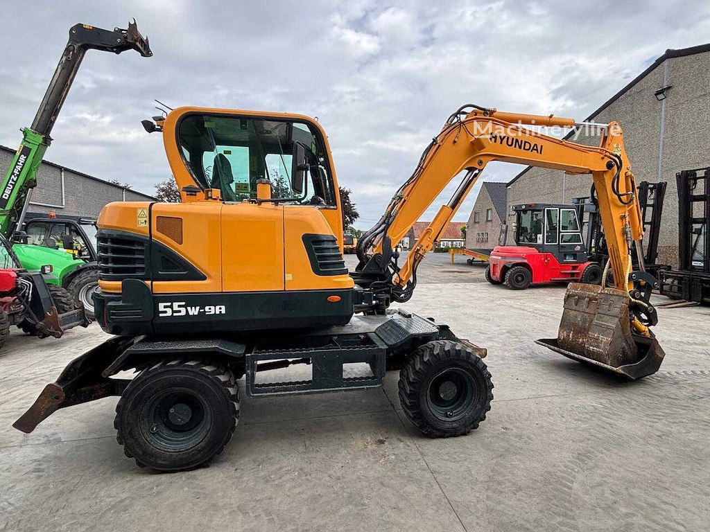 Prodaje se Hyundai R55W-9A bager točkaš na aukciji