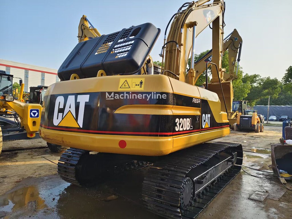 Caterpillar 320BL bager guseničar