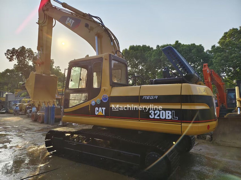 Caterpillar 320BL bager guseničar