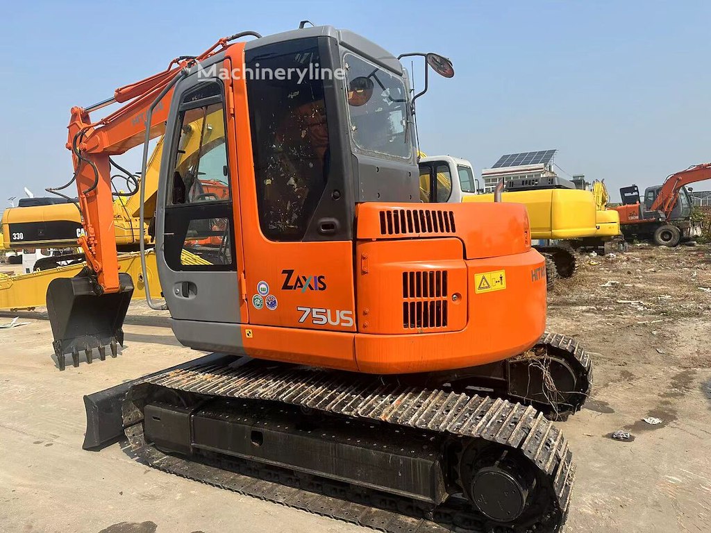 Hitachi ZX75 midi bager
