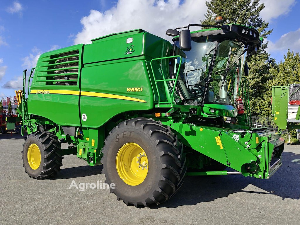 John Deere W650 i 722X kombajn za žito