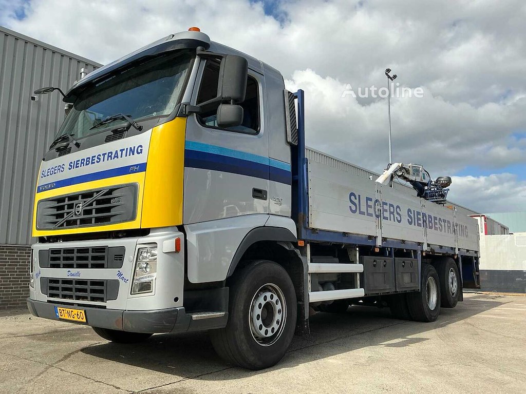Prodaje se Volvo FH400 kamion s ravnom platformom na aukciji
