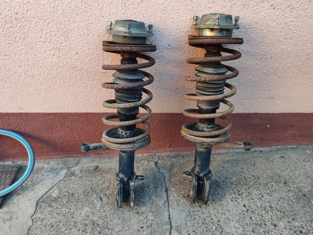 Amortizer prednji levi, desni sa oprugom Lada 112. Polovno, ocuvano
