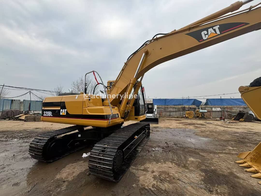 Caterpillar 320BL bager guseničar