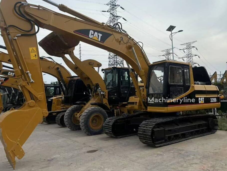 Caterpillar 320BL bager guseničar