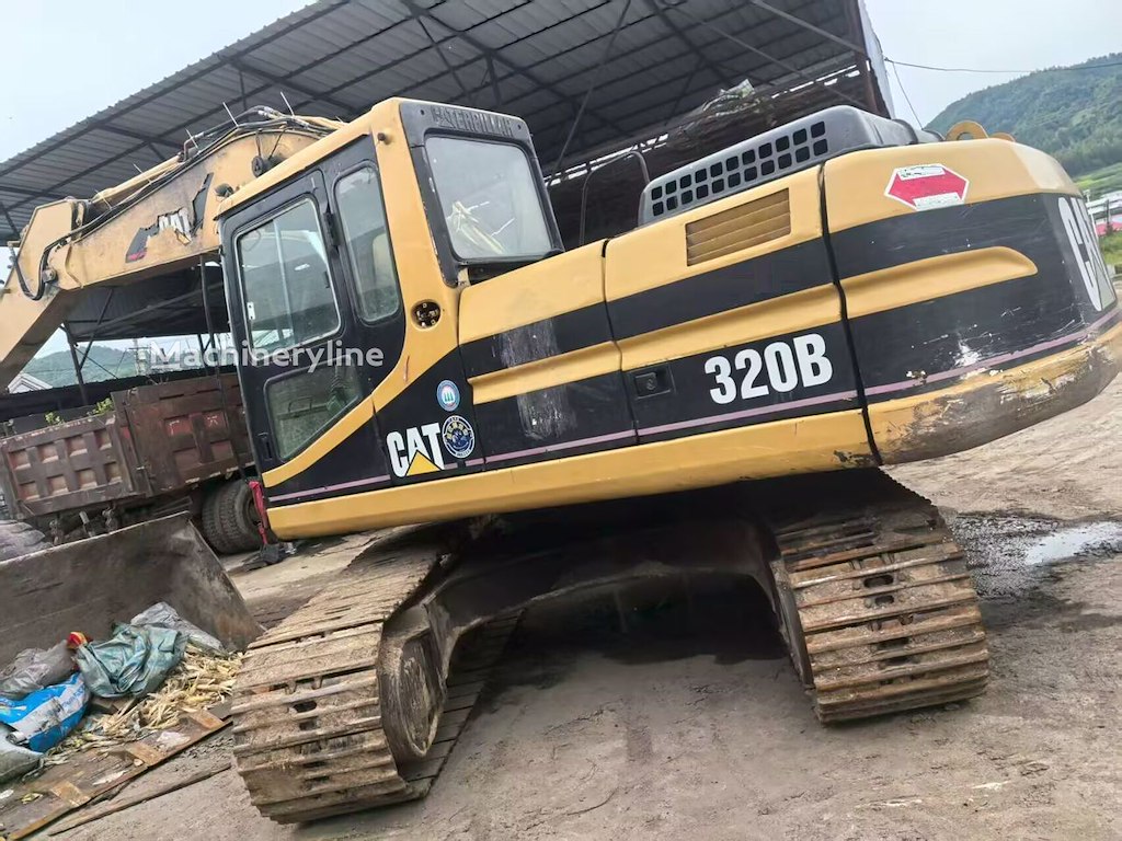 Caterpillar 320BL bager guseničar