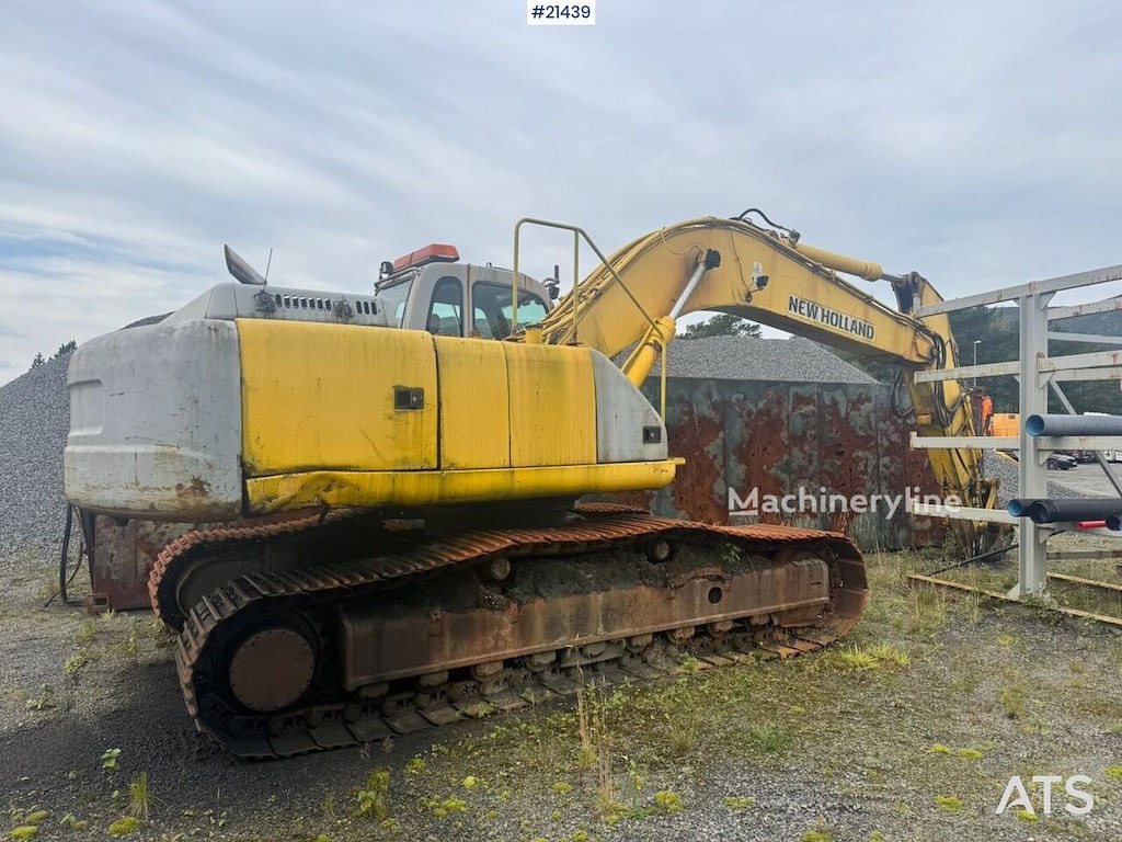 New Holland E305 bager guseničar