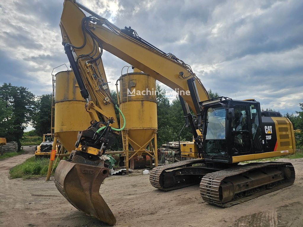 Caterpillar 320FL bager guseničar