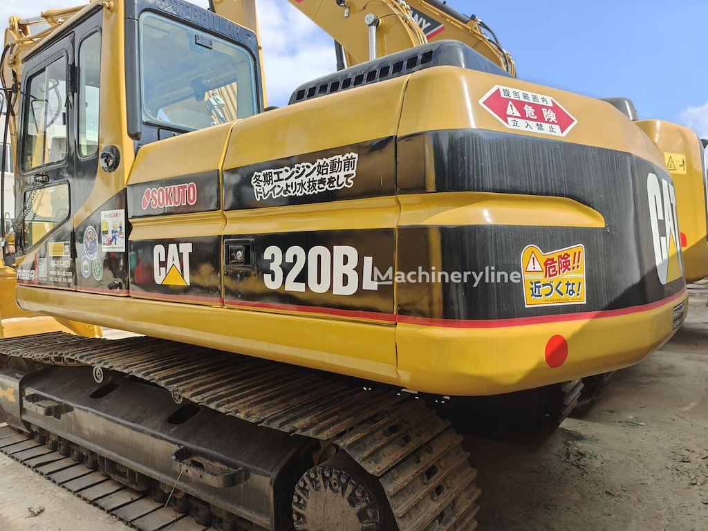 Caterpillar 320bl bager guseničar