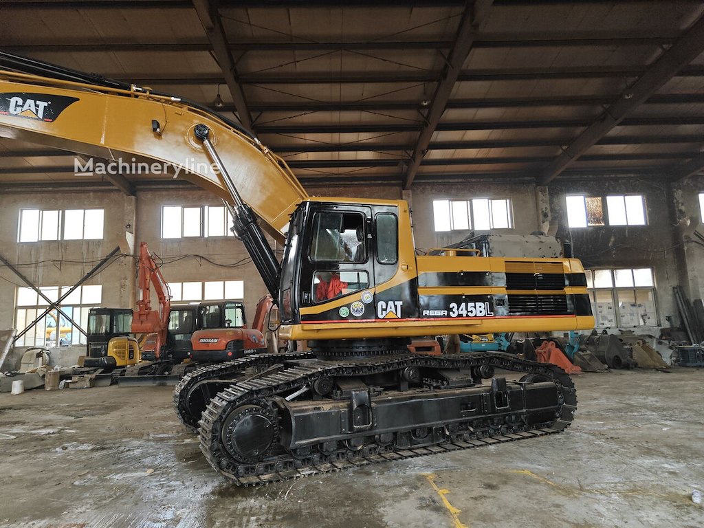 Caterpillar 345bl bager guseničar