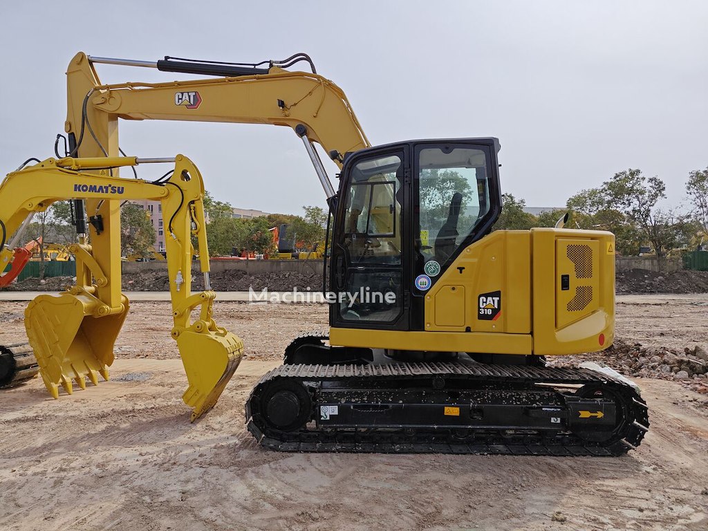 Caterpillar 310 midi bager