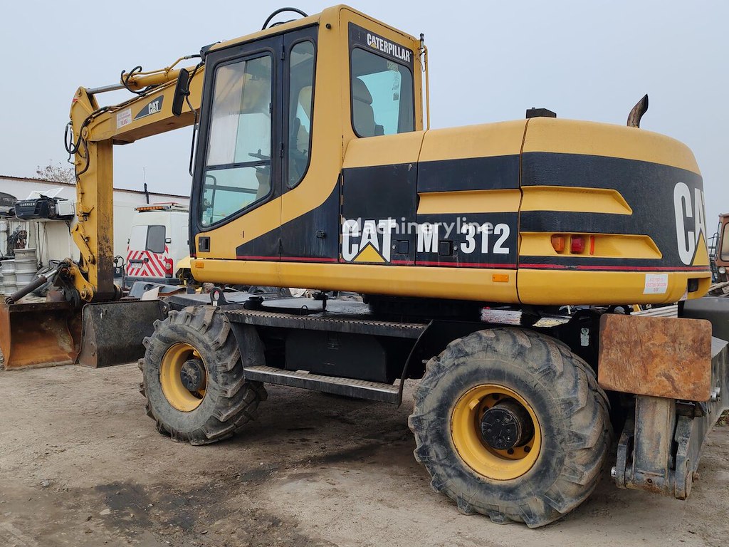 Caterpillar M312 bager točkaš