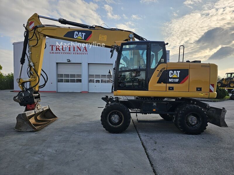 Caterpillar M318F bager točkaš
