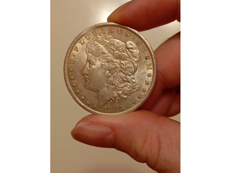 Morgan dollar 1883g. CC srebro, original