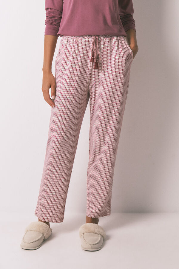 Karotten- Hose aus zartrosa Strick-
