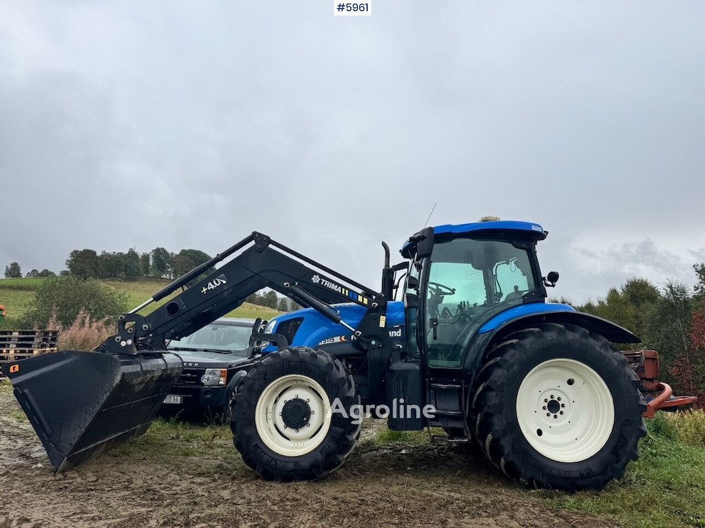 New Holland TS115A traktor točkaš