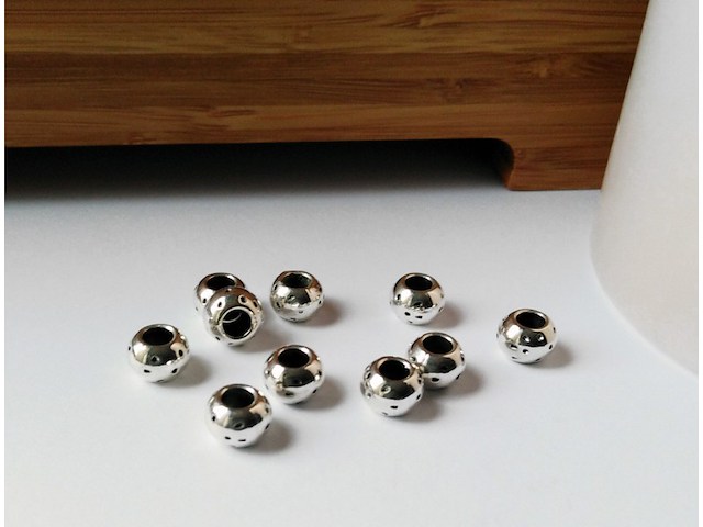 Metalna perla razdelnik 7x5 mm, rupa 3 mm - 15 komada
