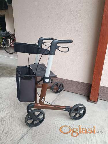 Hodalica sa naslonom i torbom za niže osobe ili decu