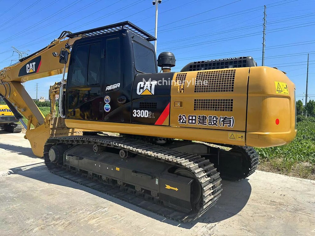 Caterpillar 330DL bager guseničar