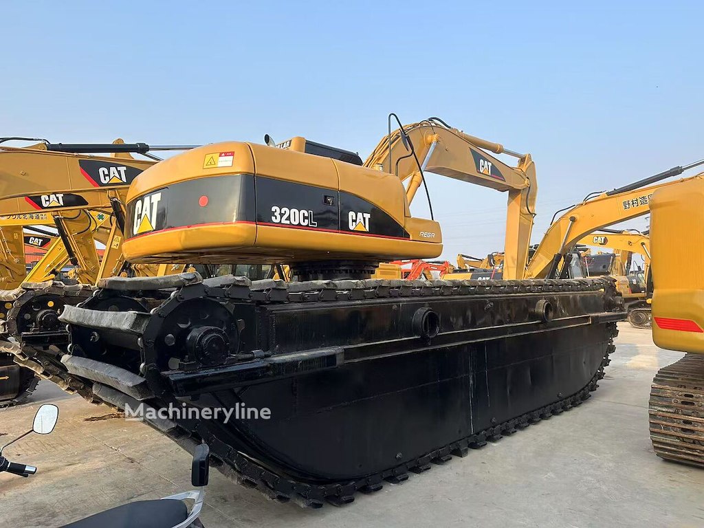 Caterpillar 320CL bager amfibija