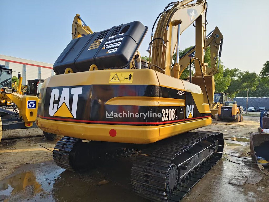Caterpillar 320BL bager guseničar