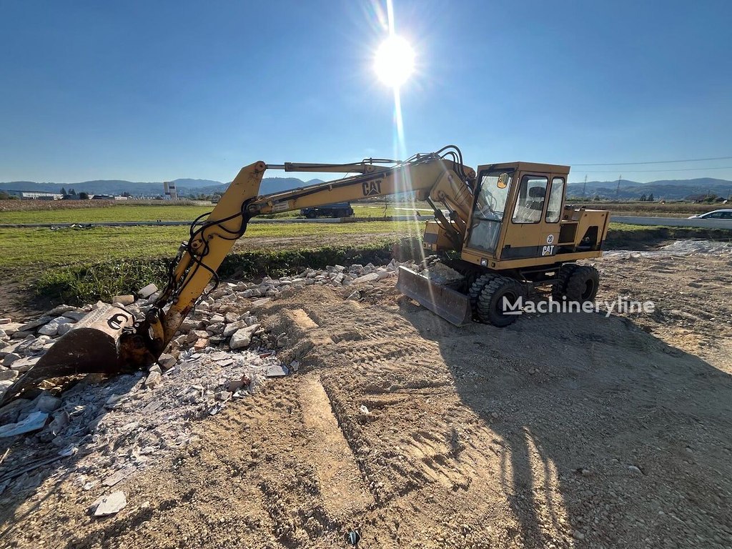 Caterpillar 212 BFT bager sa dugom strelom