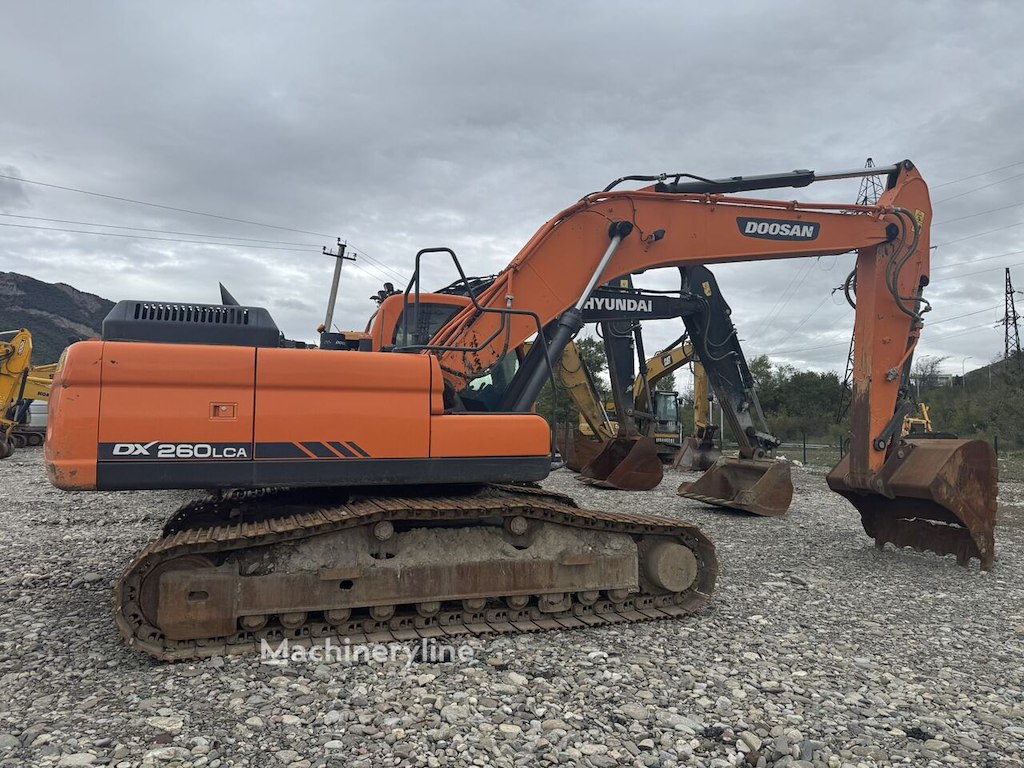 Doosan DX260 bager guseničar