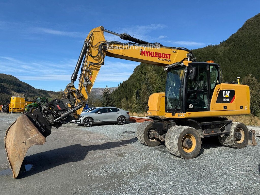 Prodaje se Caterpillar M318F Hjulgraver med tiltrotator bager točkaš na aukciji