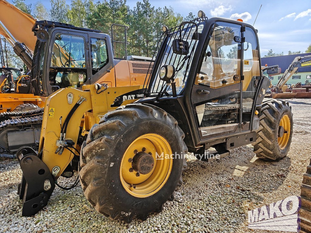 Caterpillar TH407 teleskopski utovarivač