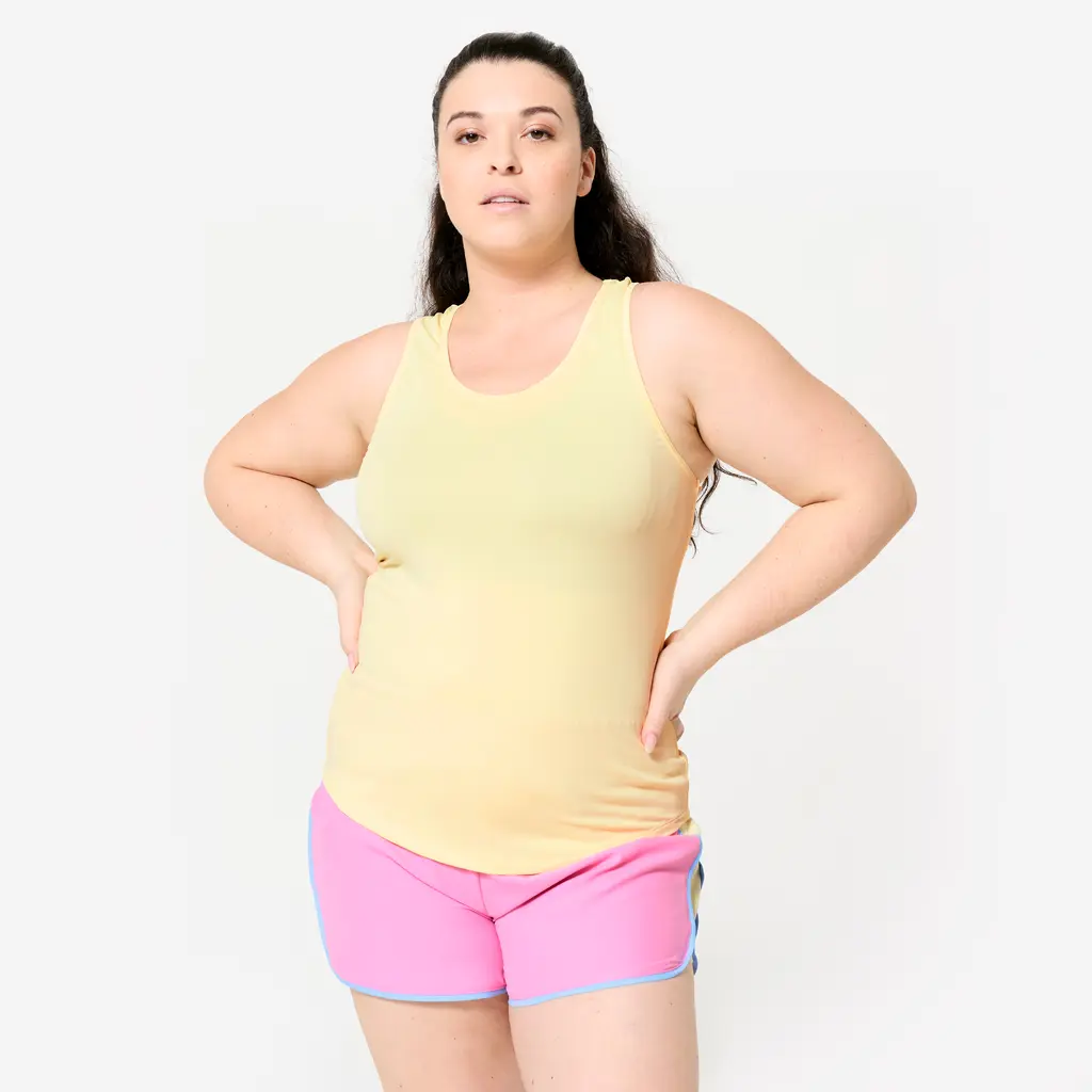 Pastelnožuta ženska majica bez rukava za fitnes