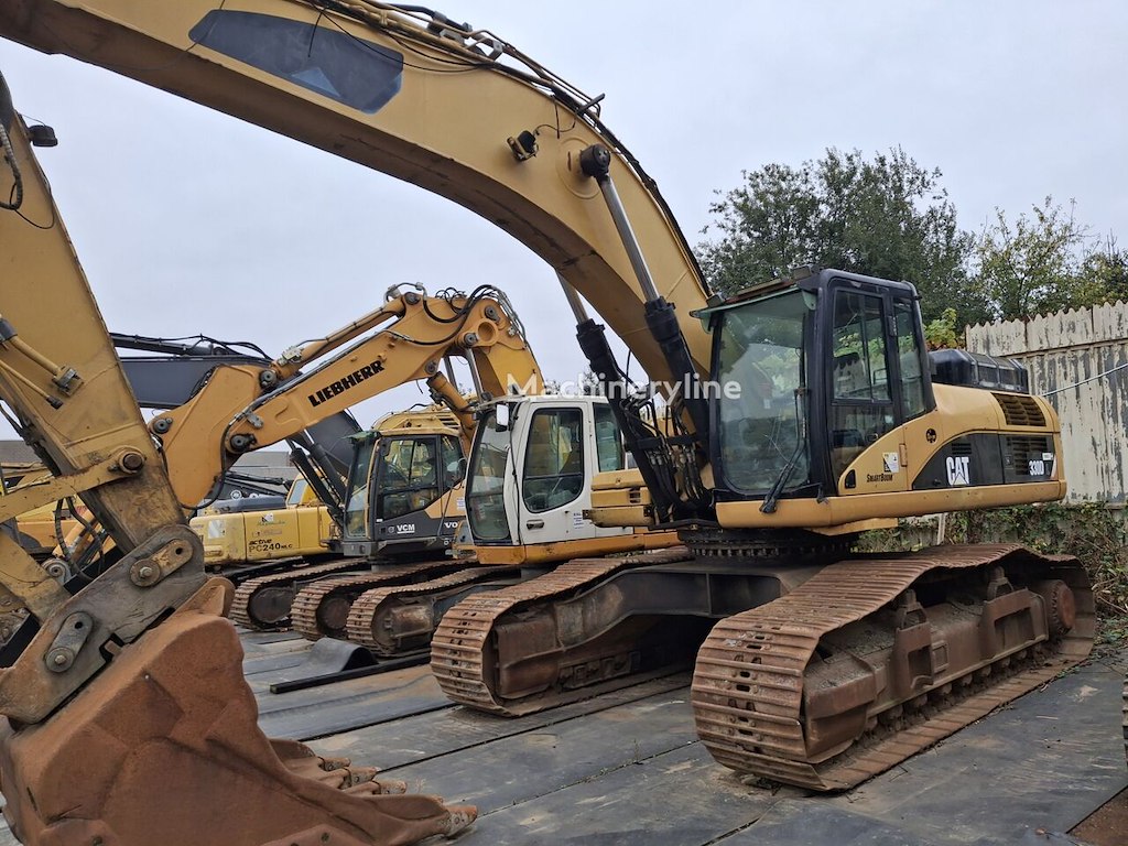 Caterpillar 330DL bager guseničar