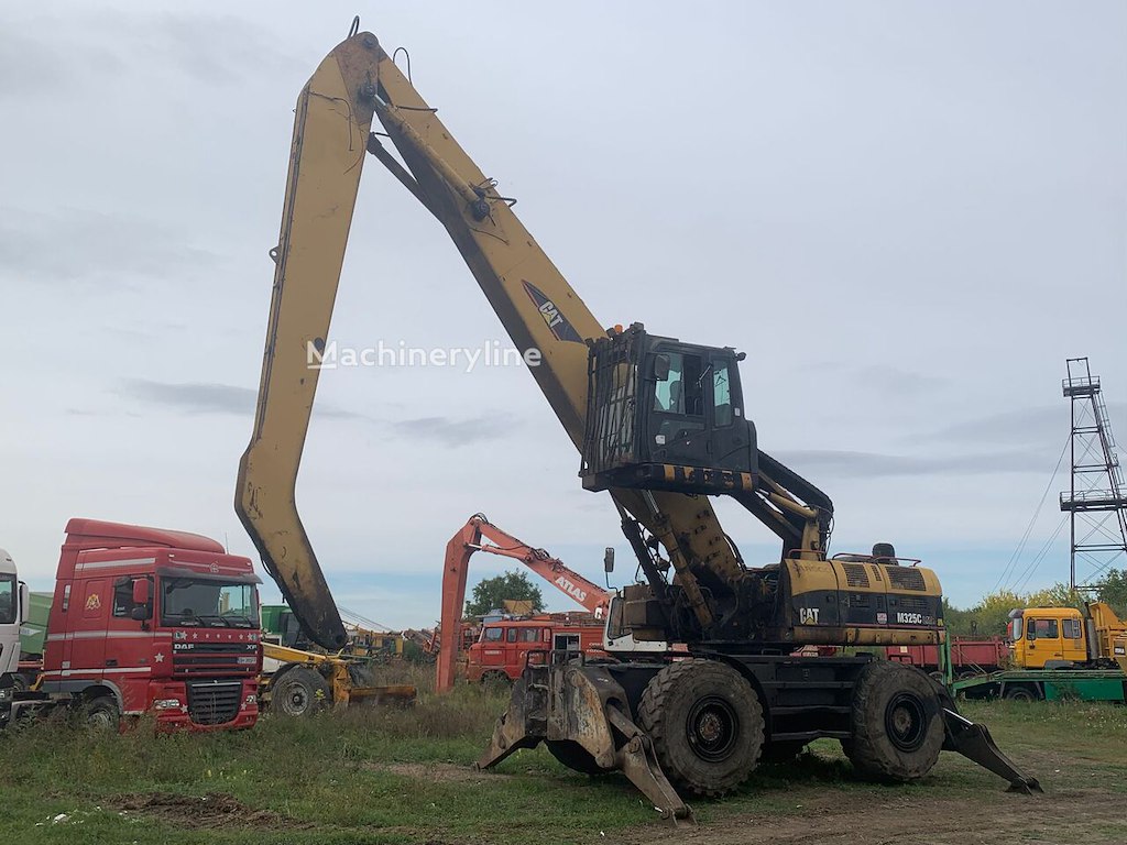 Caterpillar M325C LMH bager za pretovar