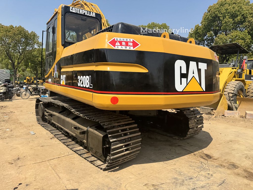 Caterpillar 320BL bager guseničar